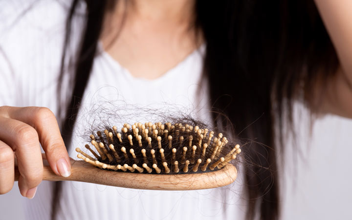 How To Stop Hair From Shedding Due To Telogen Effluvium? – SkinKraft